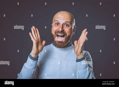 Photo Of A Caucasian Nice Guy With Beard And Blue Background Shouting