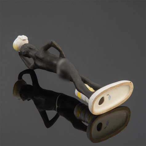 Статуэтка Африка мальчик негр с корзиной на голове скульптор Г С Столбова фарфор роспись