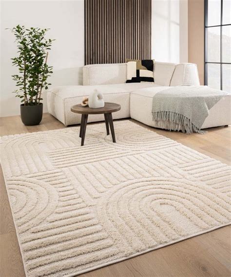 Scandinavisch vloerkleed Arc Bend crème 100x200 cm bol
