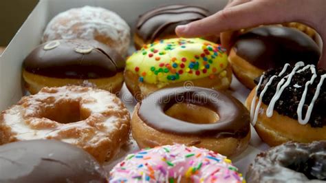 Assorted Donuts With Different Fillings And Icing Dolly Video Stock