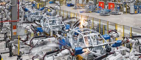 Robots Assemble Electric Vehicles Assembly