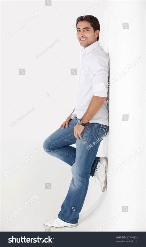 Handsome Man Leaning Against Wall Smiling Stock Photo Edit Now