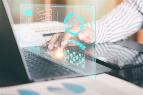 Engineer Pushing Software Update Button Through Laptop Technology
