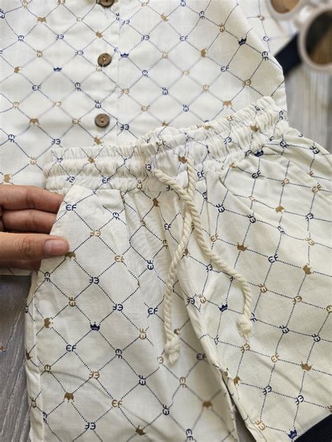 پیرهن شلوارک پسرونه تاج سفید وارلی بیبی