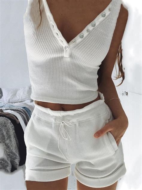 Kristin Cavallari Poses In A White Bra Top And Skirt As She Models Her