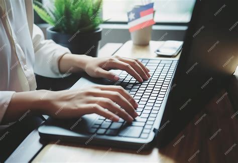 Premium Photo Photo Of Hands On Laptop Keyboard While Typing