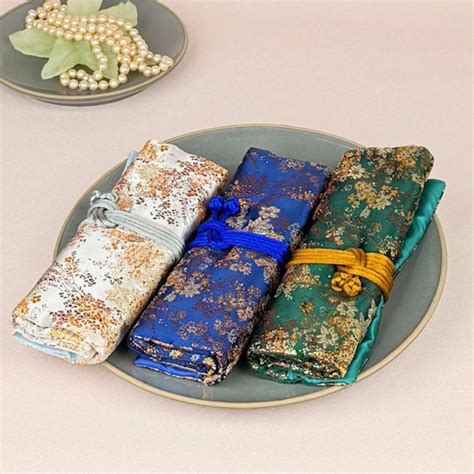 Small Golden Floral Brocade Jewelry Roll Cathayana