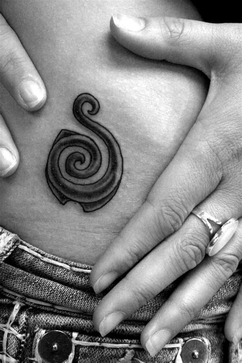 Tribal Koru Tattoos