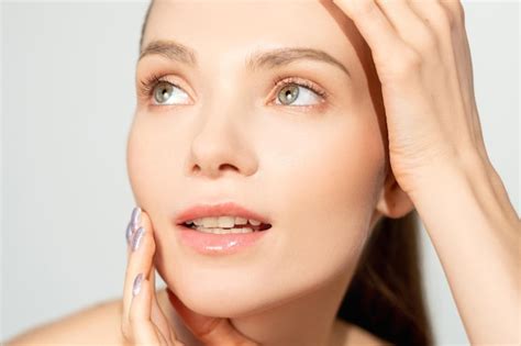 Premium Photo Beauty Face Woman With Nude Makeup Radiant Skin