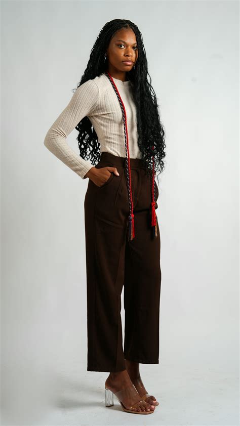 A Woman Standing With Her Hands On Her Hips Photo Free Calvin Klein