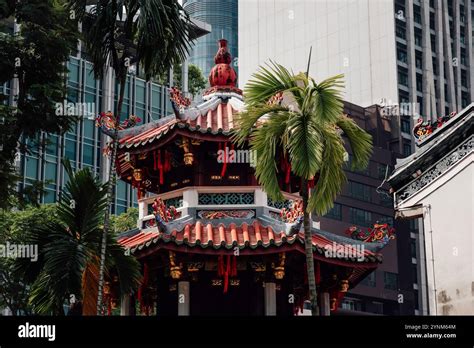 A Colored Taoist Temple In The Middle Of The Modern Architecture Of