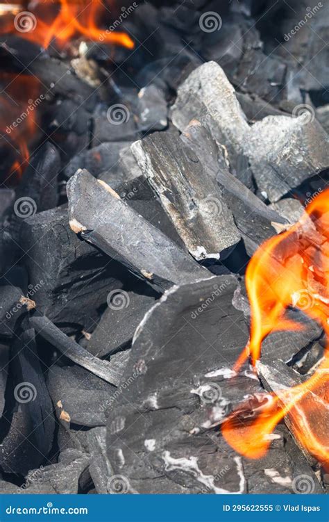 Barbecue Grill Pit With Glowing And Flaming Hot Open Fire With Red