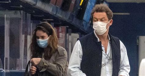 Dominic West And Lily James Seen Kissing On Flight To Rome Before