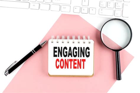 premium photo business concept notebook with text engaging content on pink paper with