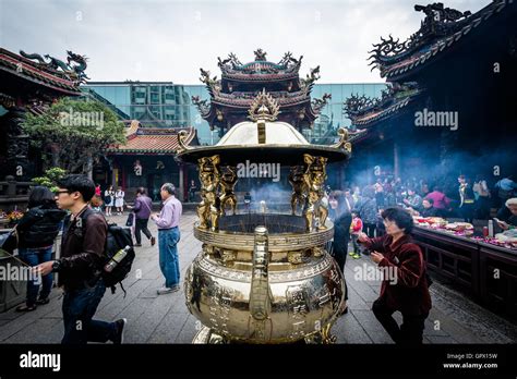 The Burning Of Incense Sticks At Longshan Temple In The Wanhua