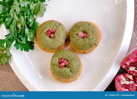 Green Bean Pkhali On Corn Tortilla Mchadi On A White Plate A Traditional Georgian Dish Of