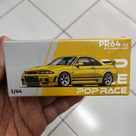 Jual Pop Race 164 Nissan Skyline Gt R R33 Nismo 400r Yellow Shopee
