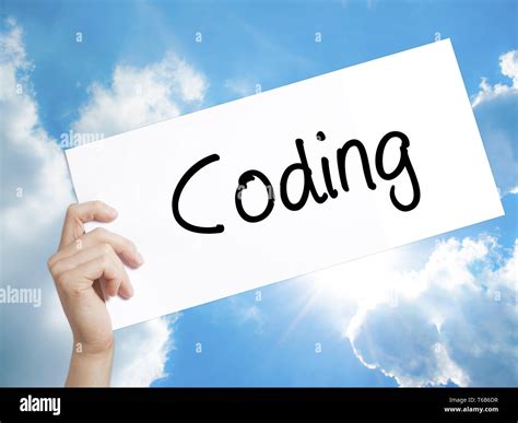 Coding Sign On White Paper Man Hand Holding Paper With Text Isolated