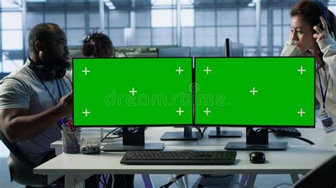 Close Up Of Multi Monitor Isolated Screen Computer In Data Center Stock