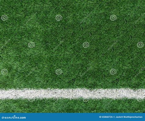 White Stripe Line At The Corner On Artificial Green Soccer Field As