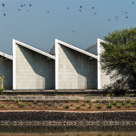 Graam Architecture Wraps Burgundy Office Building In Timber Exoskeleton