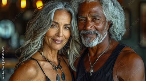 Portrait Of A Mature Fit Interracial Couple Married And In Love Stock