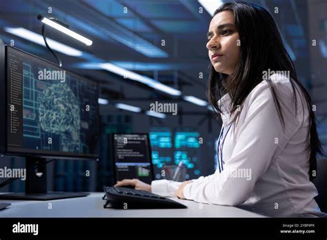 Admin Working On Pc In Data Center With Artificial Intelligence