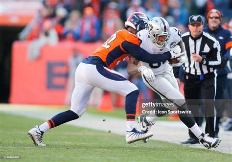 Oakland Raiders Tight End Darren Waller Is Brought Down By Denver