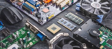 Computer Hardware Configuration Is Laid Out On A Dark Background