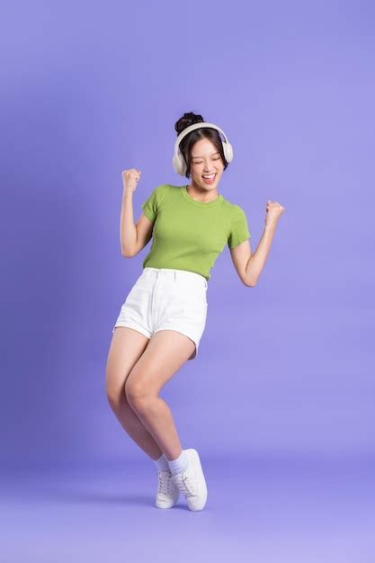Premium Photo Full Body Image Of Beautiful Asian Girl Posing On Pink
