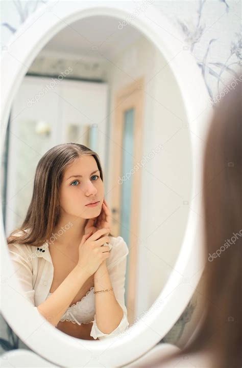Girl Looking At Mirror Telegraph