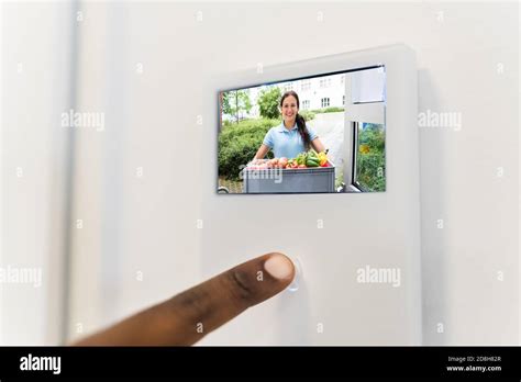 African Man Using Video Intercom Entrance Safety System Stock Photo Alamy