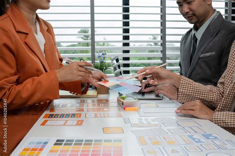 Creative Team Collaborating On Ux Ui Design Concepts With Color