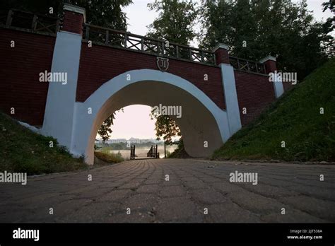 pedestrian bridge with an arch in the city park the camera installed