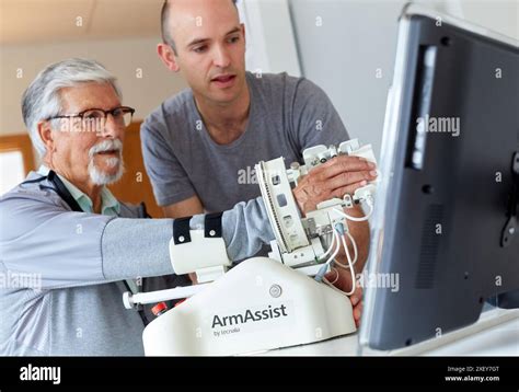 Patient With Assistive Robot For Upper Limb Rehabilitation The Robot Armassist Allows Passive