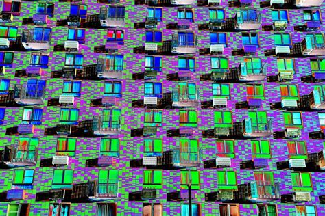 Frontal View Of The Facade Of The Building With Many Windows Changed Color Scheme Colorful