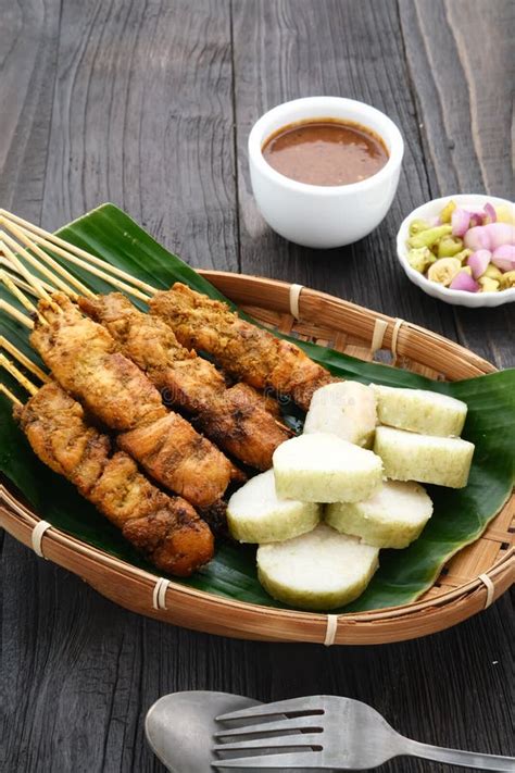 Sate Ayam Chicken Satay With Peanut Sauce And Lontong Rice Cake