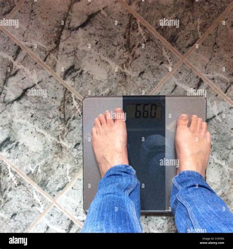 Female On Scales Hi Res Stock Photography And Images Alamy