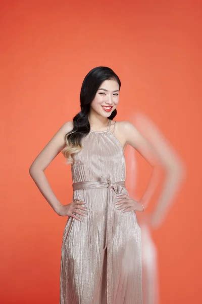 Portrait Beautiful Smiling Girl Shiny Pink Dress Throwing Confetti Red