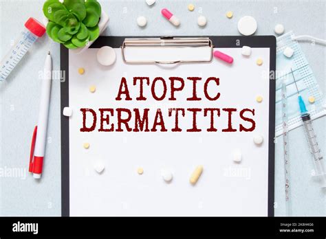 The Diagnosis Atopic Dermatitis Written On A Clipboard Stock Photo Alamy