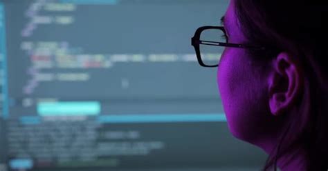 engineer developing software app using laptop typing code on screen programmers coding internet