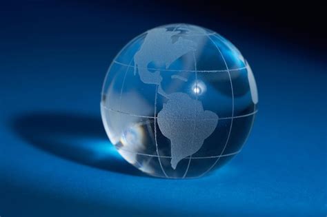 Premium Photo Mini Globe On Red Backgrounnd