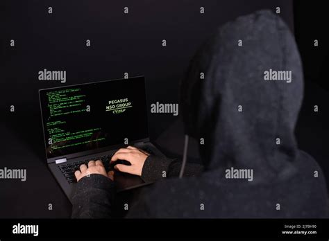 Concept Of Hacking And Malware Hacker Using An Abstract Laptop With A