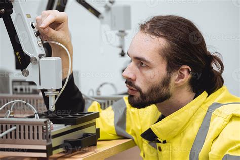 Engineer Male Education In Industrial Robotics Program In University Engineering Lab Classroom