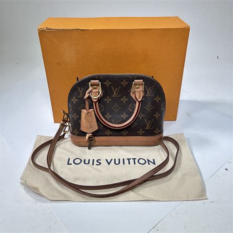 Louis Vuitton Alma Bb Monogram Canvas Handbag