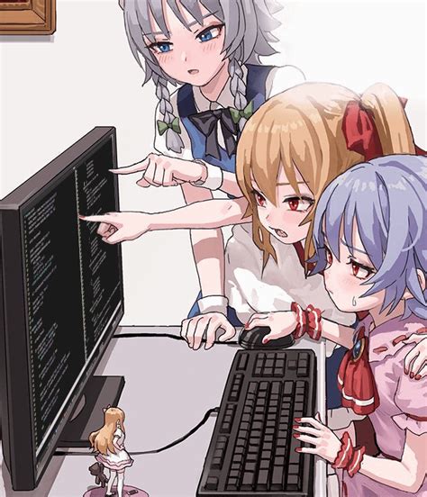 pictured below a group of c programmers hard at work on an foss