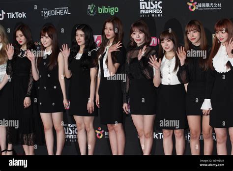 Members Of South Korean Girl Group Izone Stylized As Izone Pose As