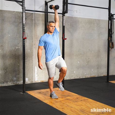 Dumbbell Single Leg Curl To Press Exercise How To Skimble