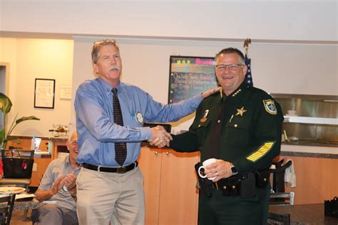 Merritt Club Member Jason Hedman Present To Brevard County Sheriff