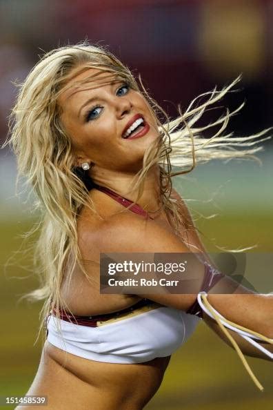 A Washington Redskins Cheerleader Preforms During The Redskins And